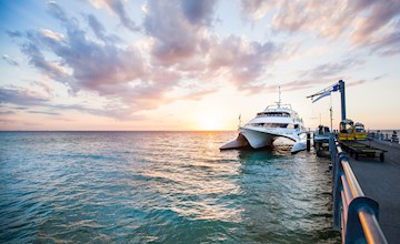 Sunsets over the beaches & water | Tangalooma Moreton Island